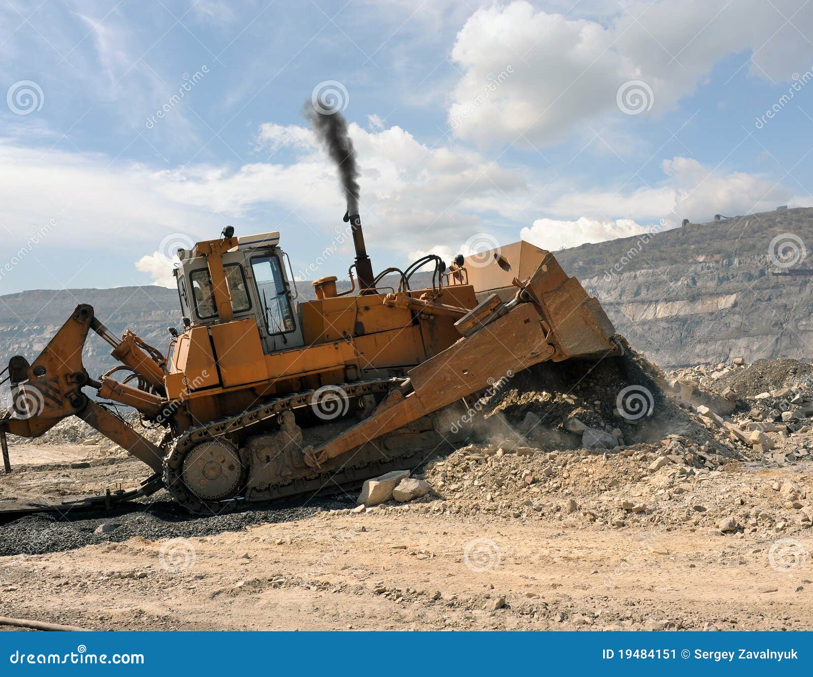 Big Loader Machine With Steel Metal Chains Removing Big Snow Pile From ...