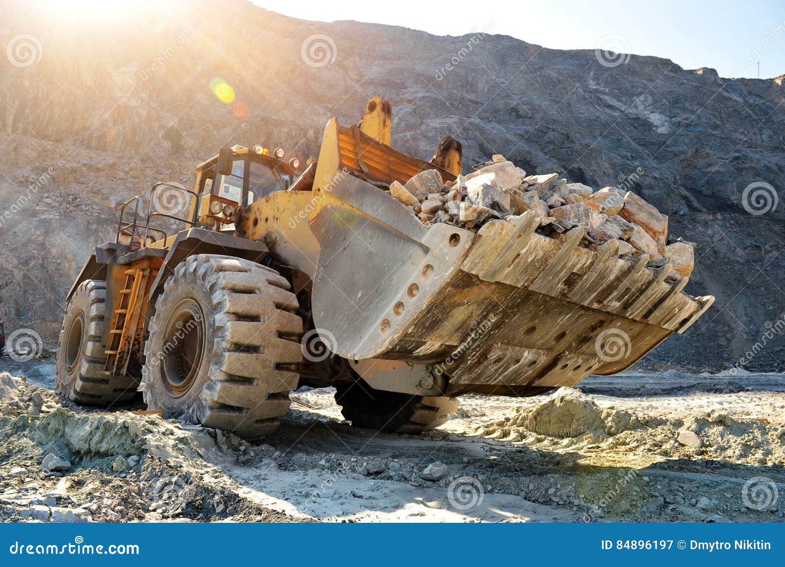 Wheel Loader Machine Unloading Rocks Stock Image - Image of blade ...