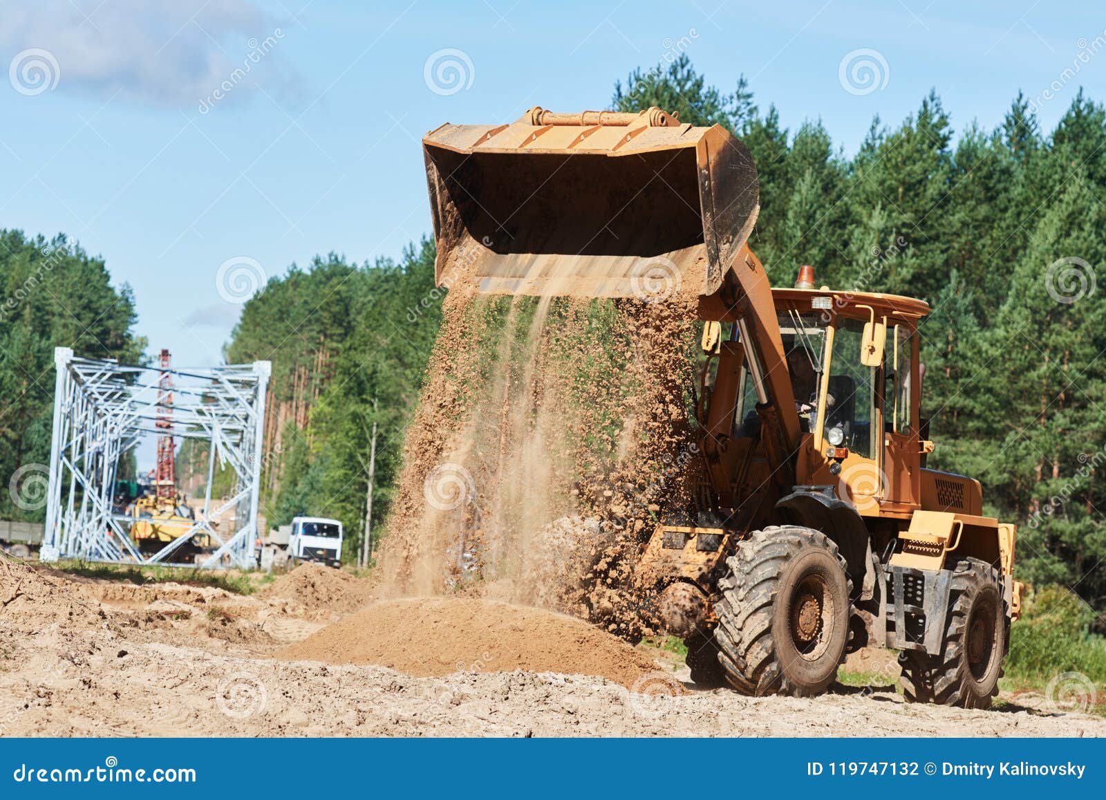 Wheel Loader Machine Unloading Sand at Eathmoving Works at Construction ...