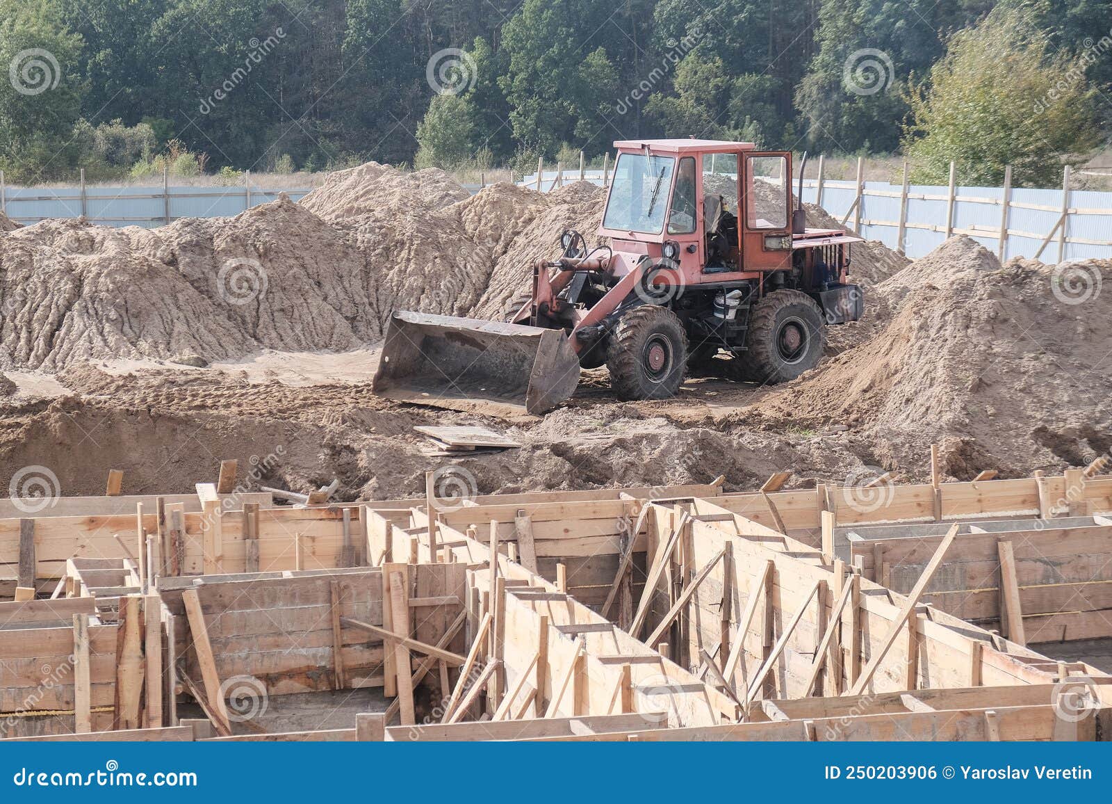 Wheel Loader Machine Unloading Soil in Earthmoving Works at ...