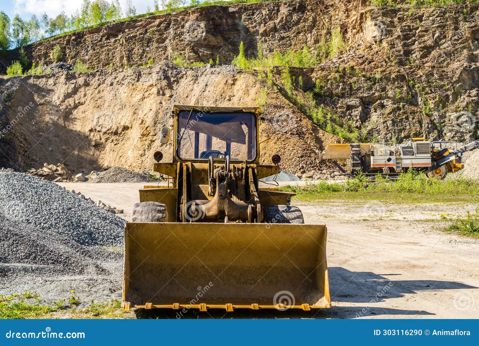 Wheel loader in a quarry stock photo. Image of transport - 303116290