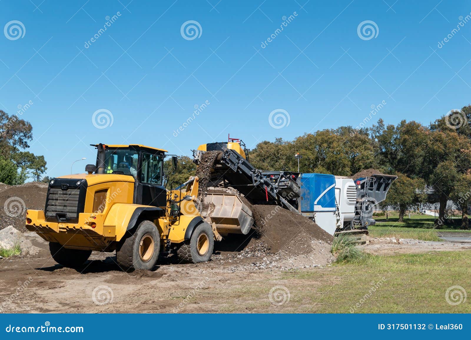 Maneuvers in the Quarry: Loader in Action, Transporting Crushed Gravel ...