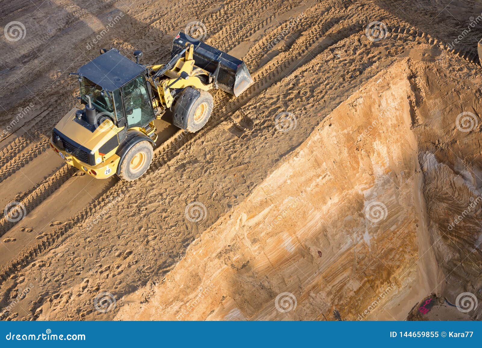 Wheel_loader_site stock image. Image of acclivity, wheeled - 144659855