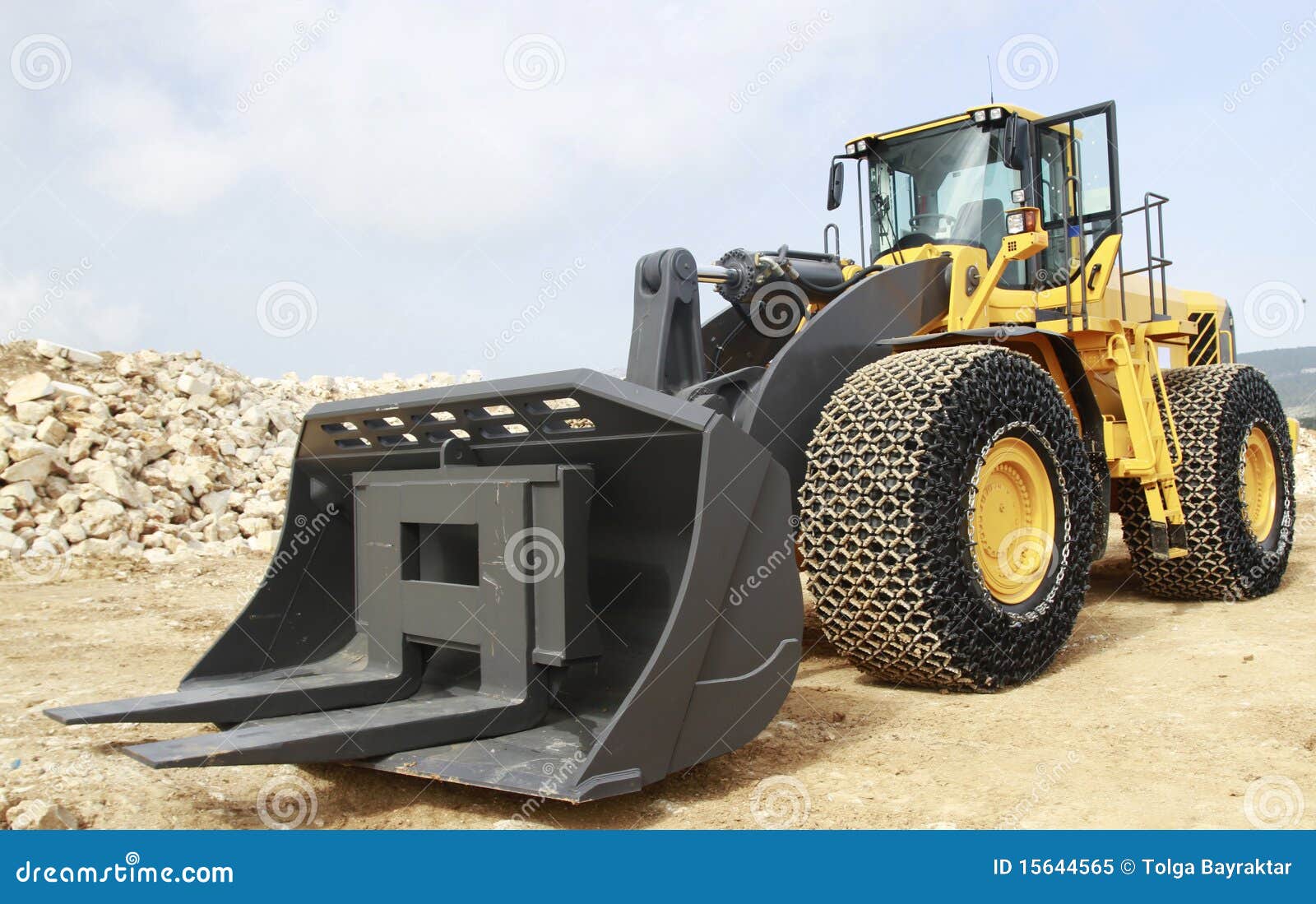 Wheel Loader on a Stone Mine Stock Image - Image of built, tire: 15644565