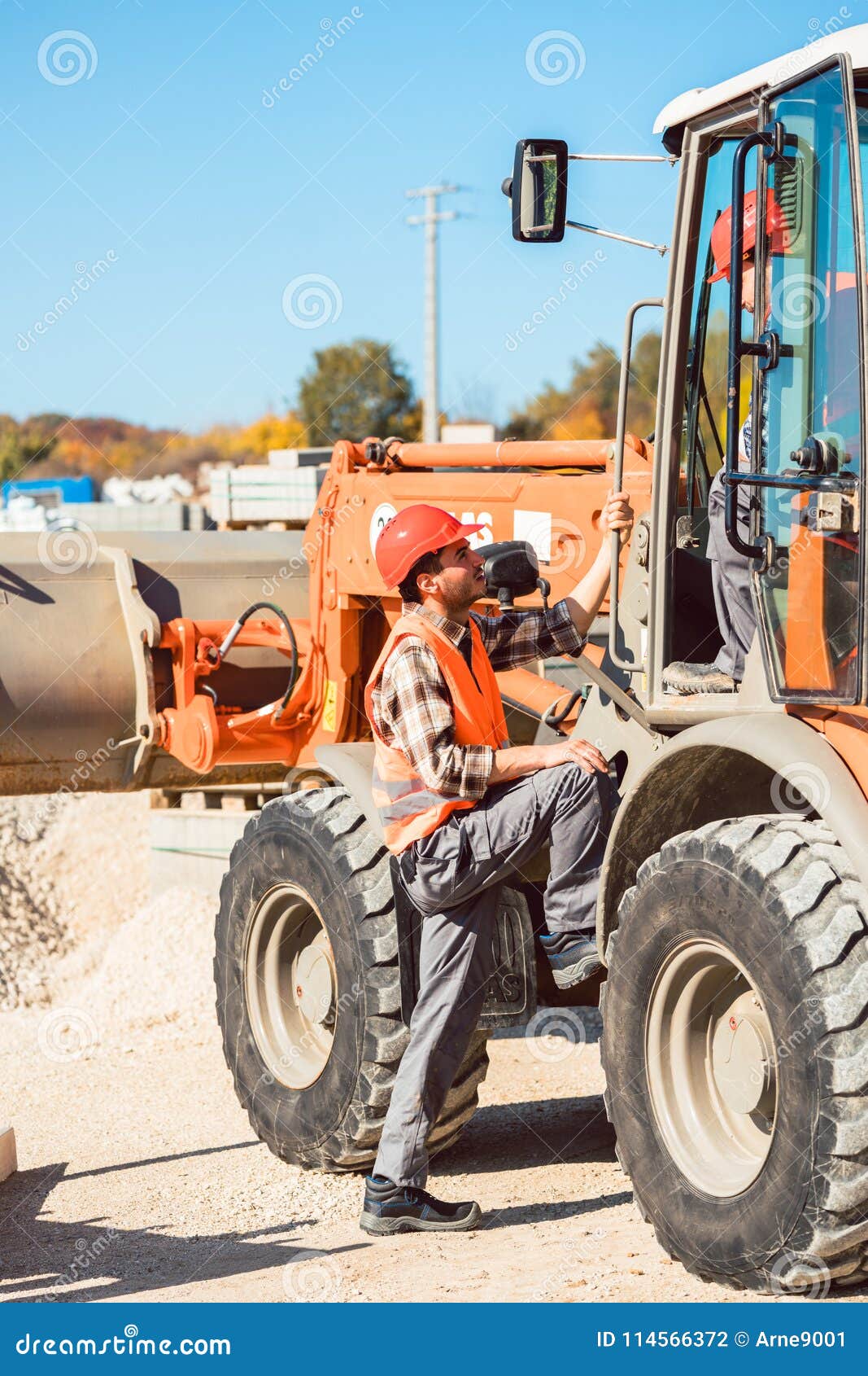 Wheel Loader with Tip-up Bucket on Construction Site Stock Photo ...