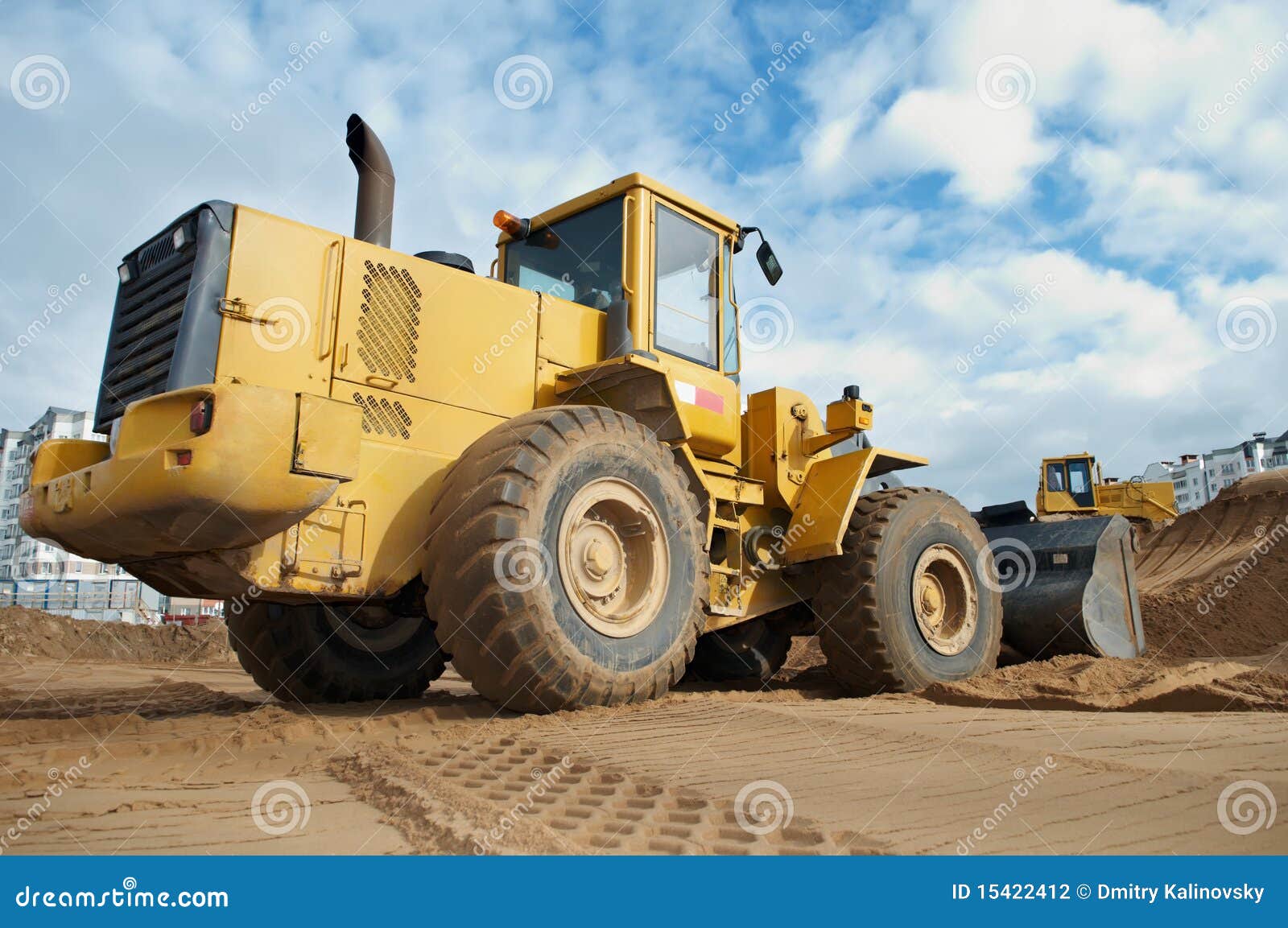 Wheel loader at work stock photo. Image of action, bulldozer - 15422412