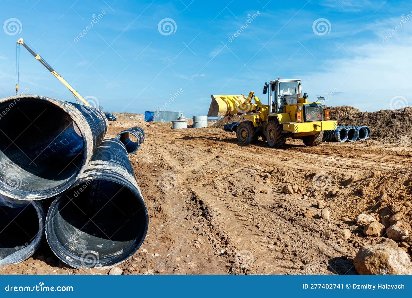 Wheel Machine for Loading Performs Work on Laying Large Diameter Pipes ...