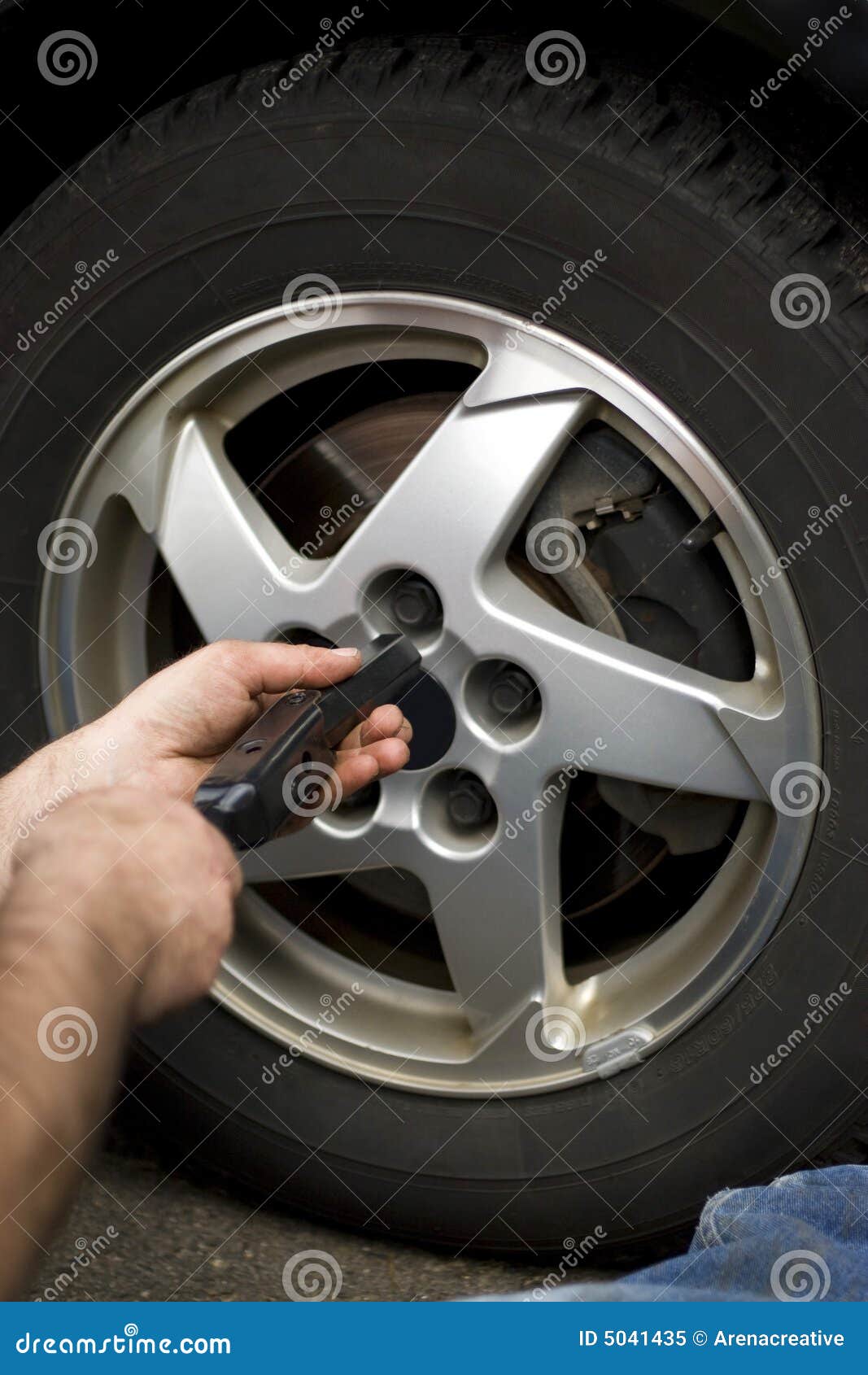 Wheel Mechanic stock image. Image of garage, industry - 5041435
