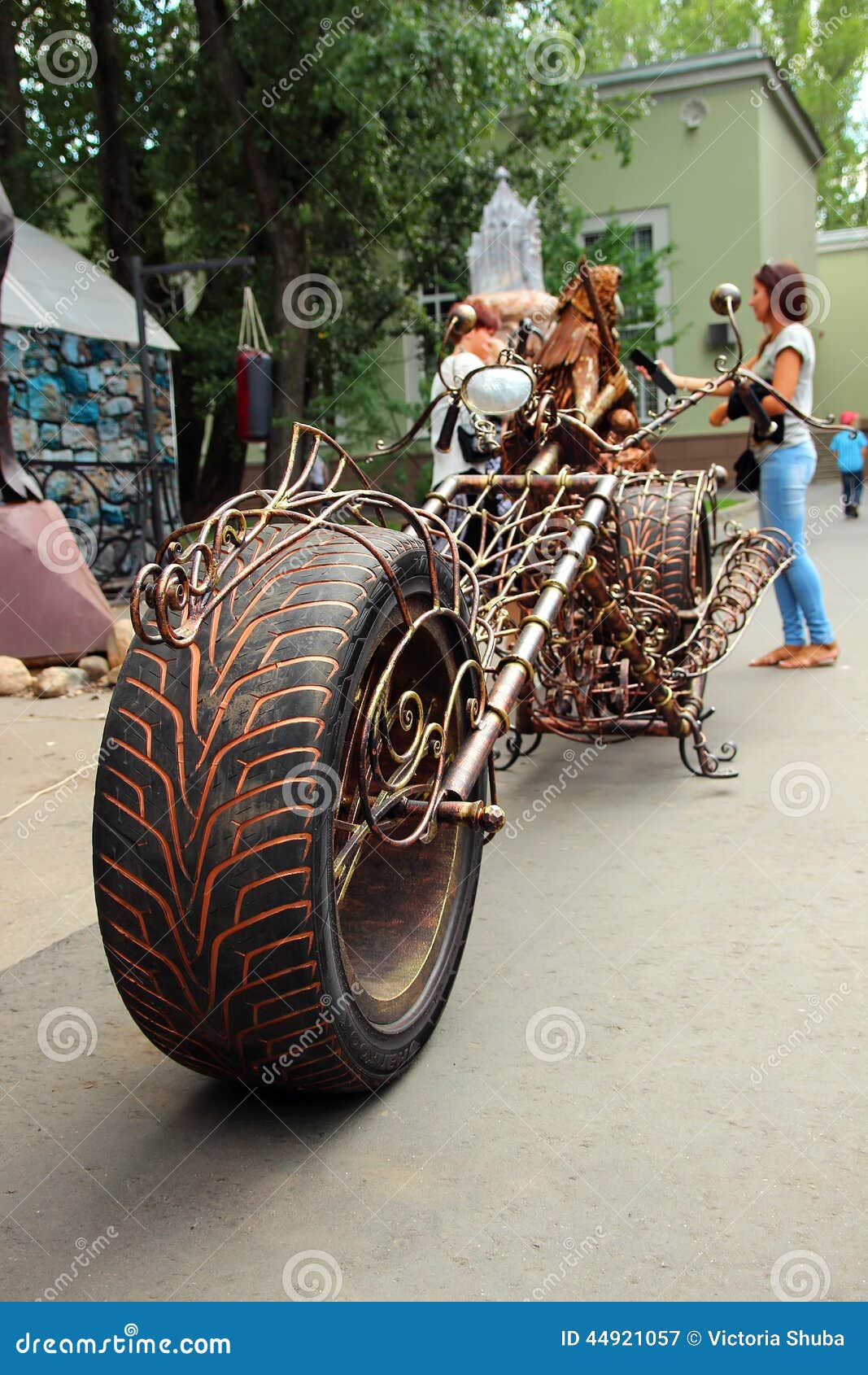 Wheel of a Motorcycle in the Iron Sheath Editorial Photography - Image ...