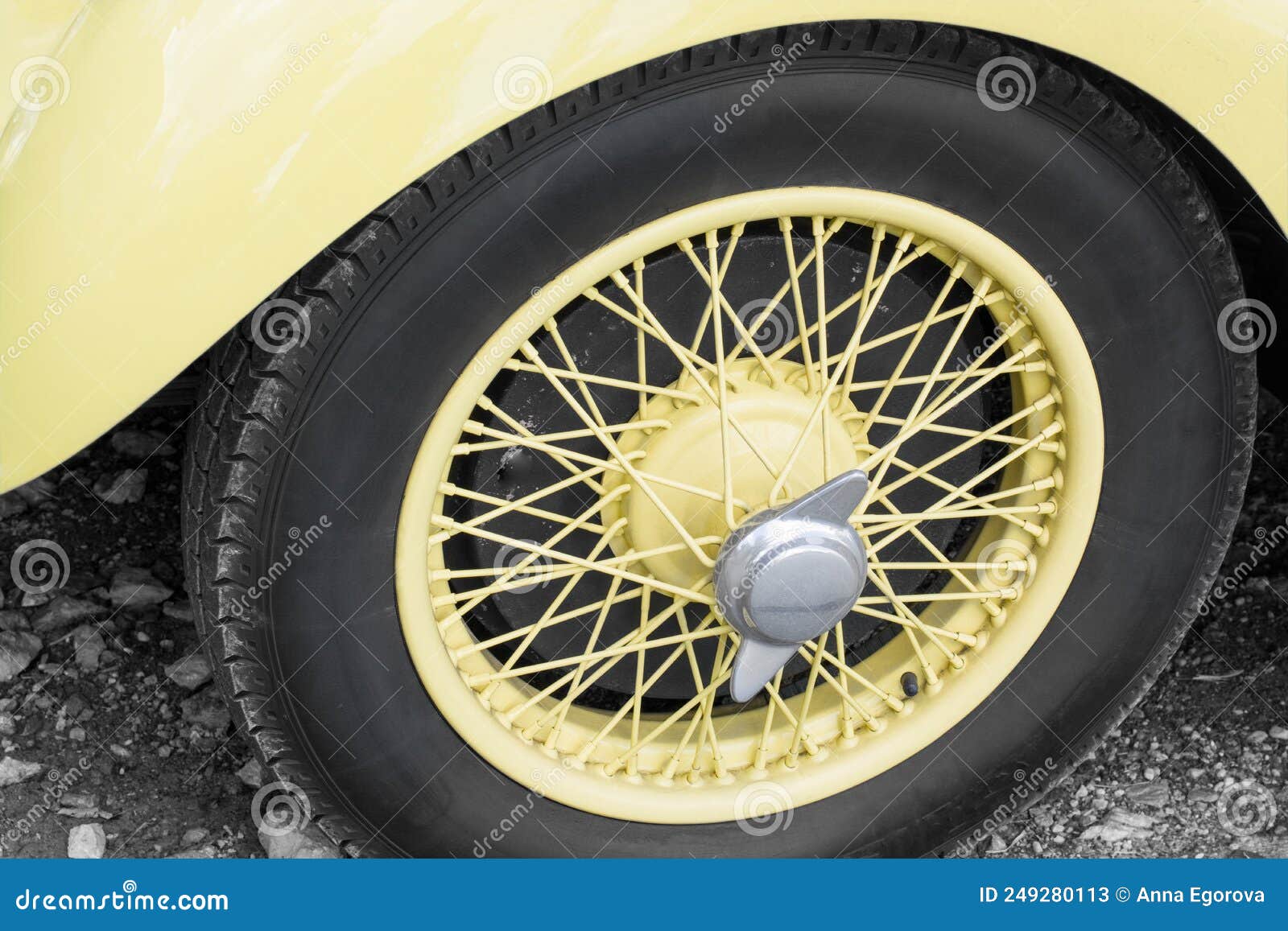 Wheel of a Non-modern CarWheel with Yellow Spokes of a Non-modern Car ...