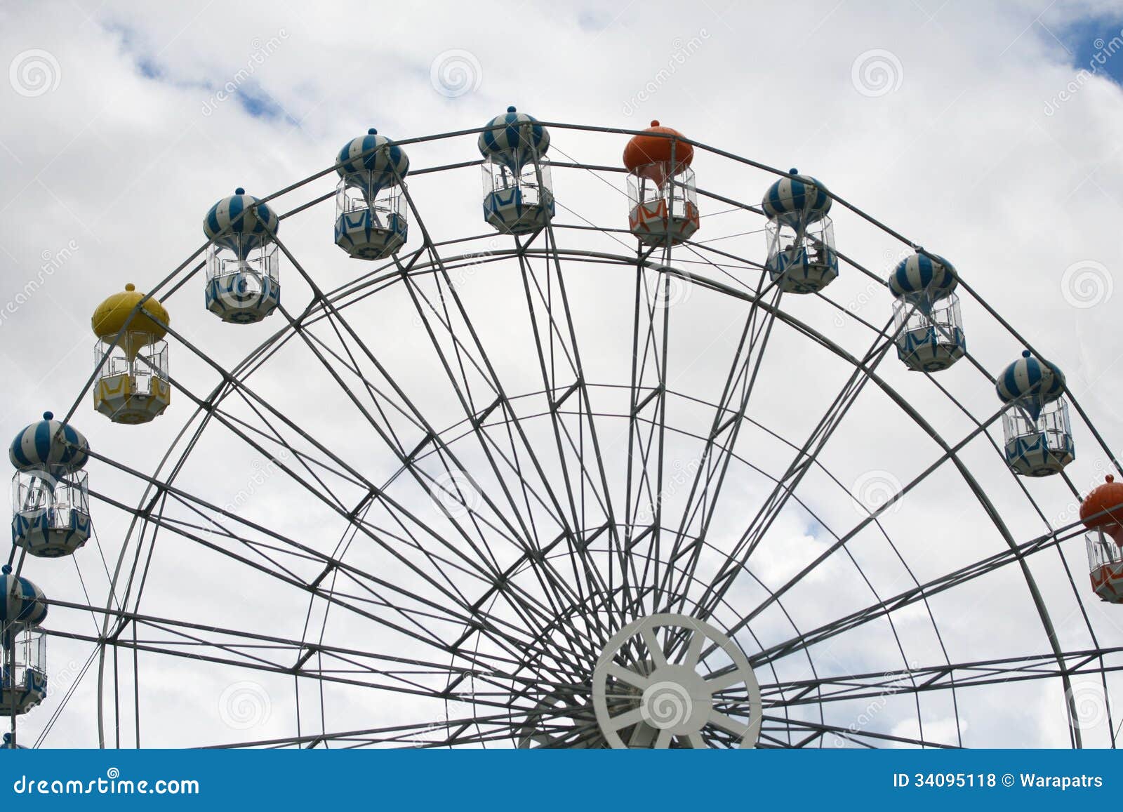 Wheel on sky in cloudy day stock photo. Image of summer - 34095118