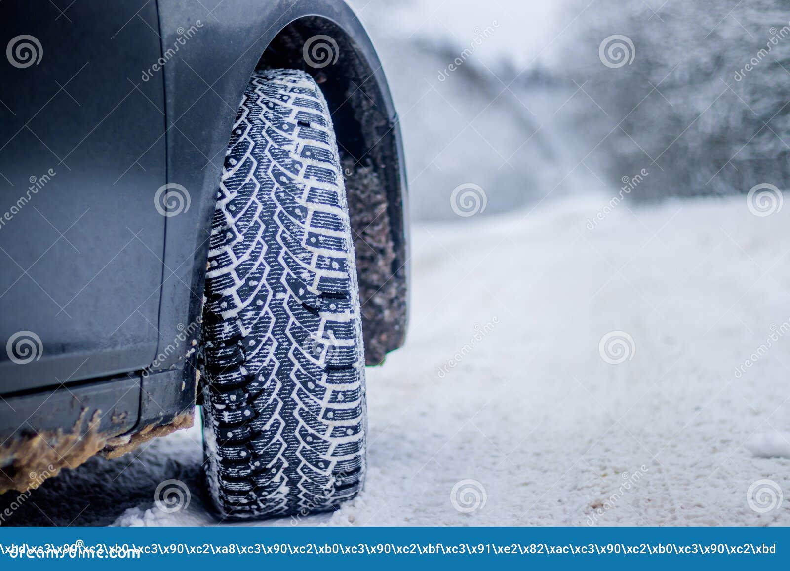 Wheel with Spikes on a Winter Road. Winter Road. Snow Road. Car on the ...