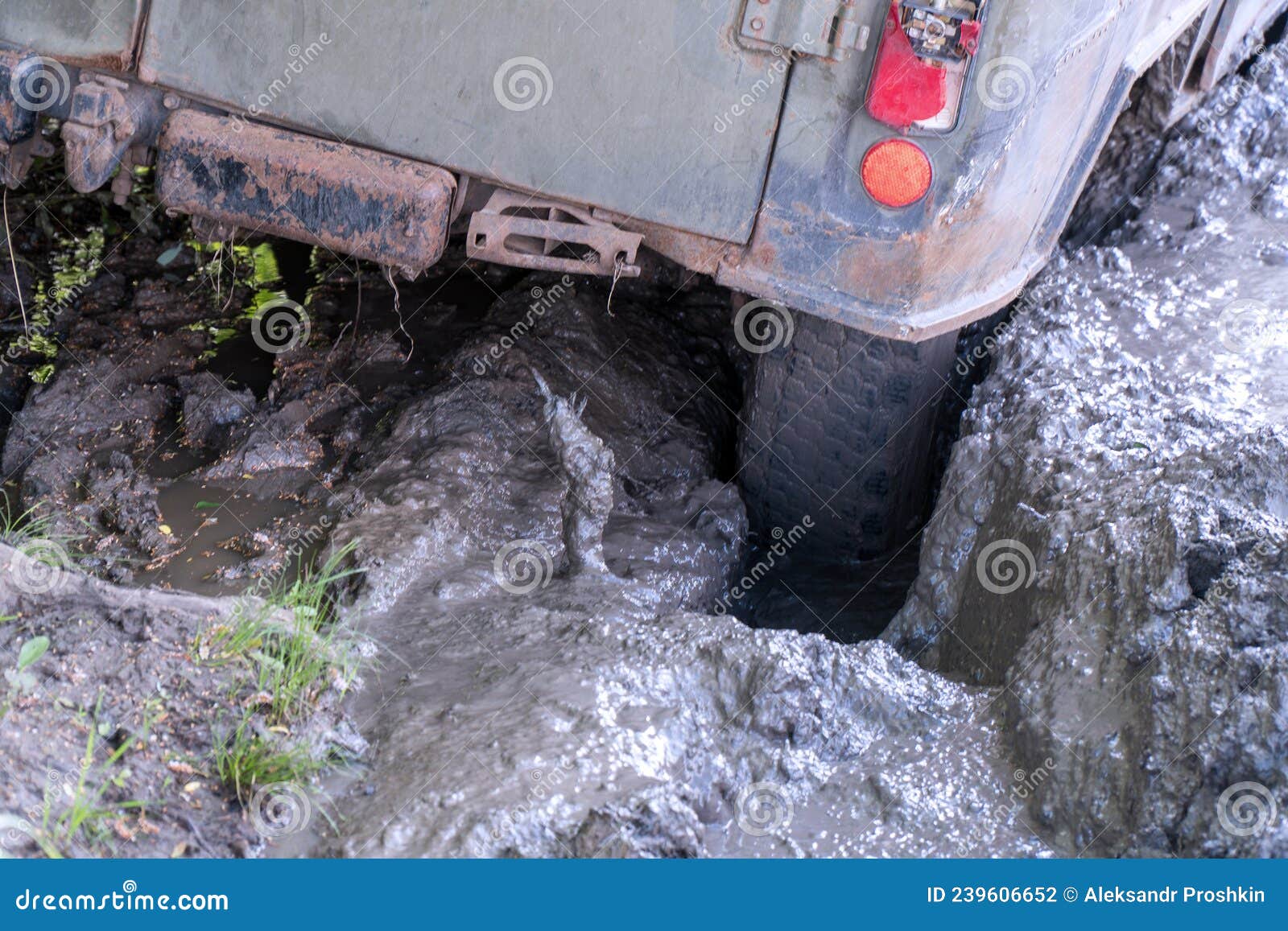 Wheel of an SUV Stuck in Deep Mud on an Impassable Country Road Stock ...