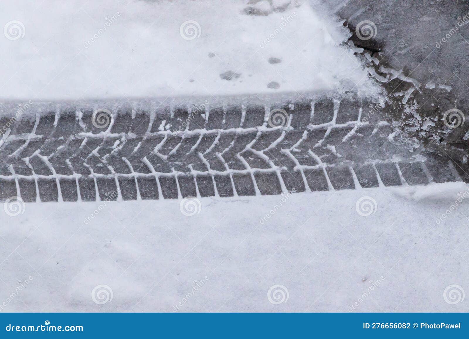 Wheel Track on Fresh Snow. Wheel Tracks on the Road Covered with Snow ...