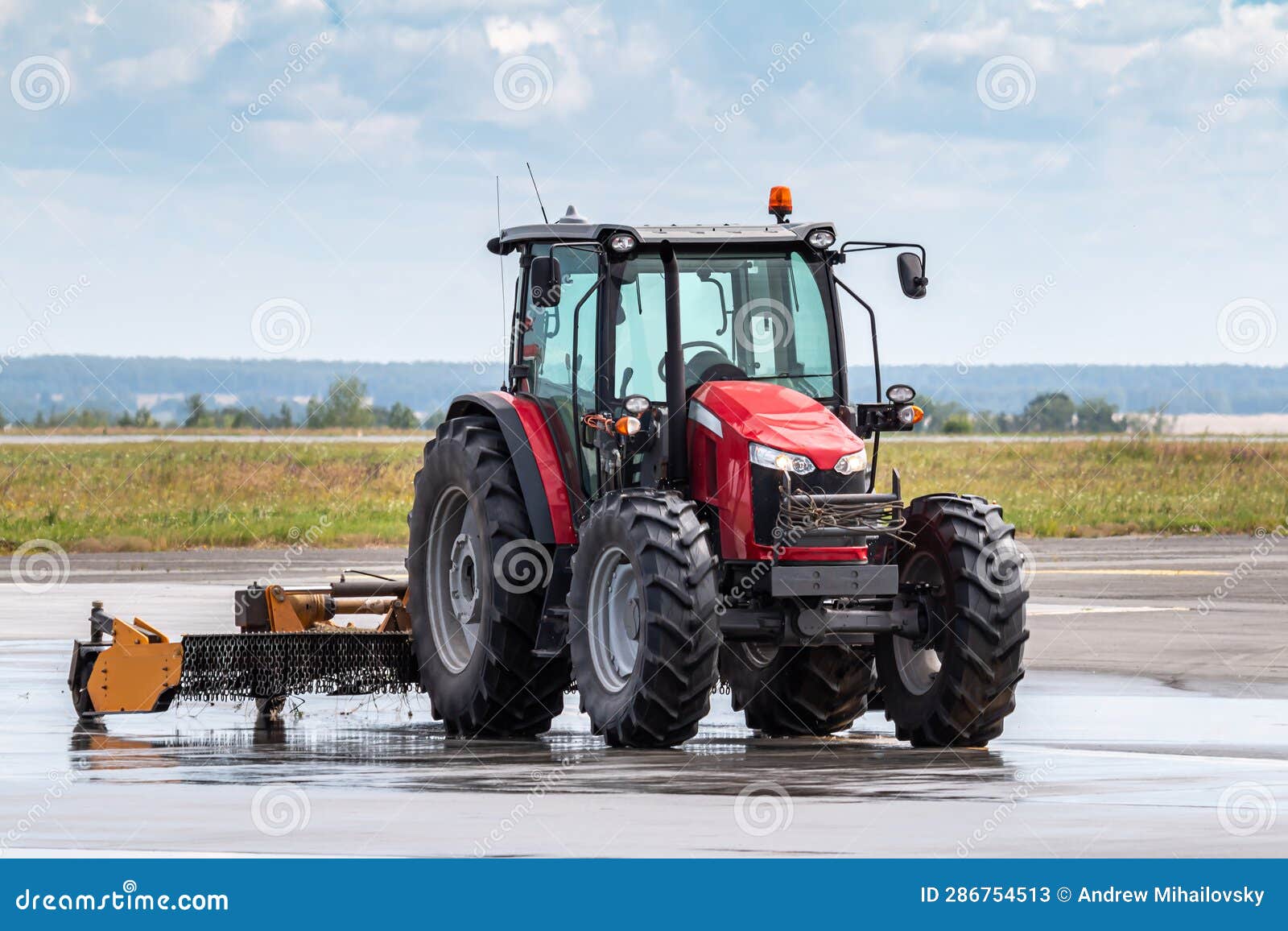 Wheel Tractor with Lawn Mower on the Road Stock Image - Image of wheel ...