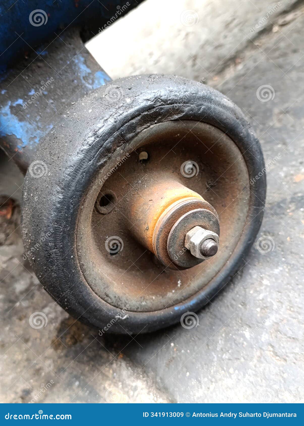 A Wheel with Worn Air Compressor Tire Rubber Stock Image - Image of ...