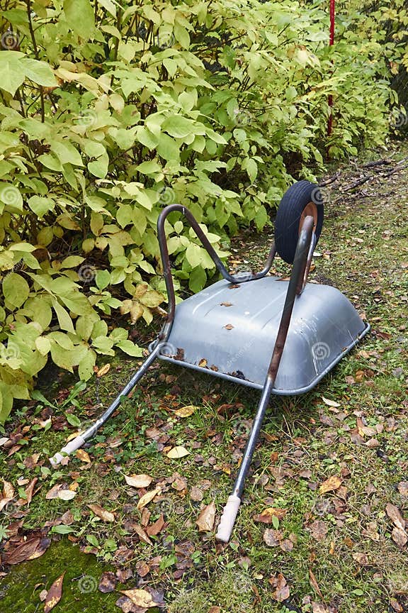 Wheelbarrow upside down stock photo. Image of wheel - 196387620