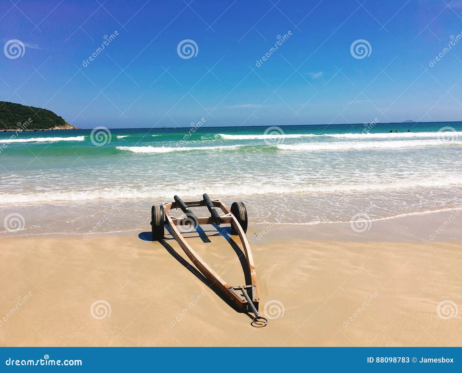 The Wheelbarrow on the Beach with Sea Wave Foam Stock Image - Image of ...
