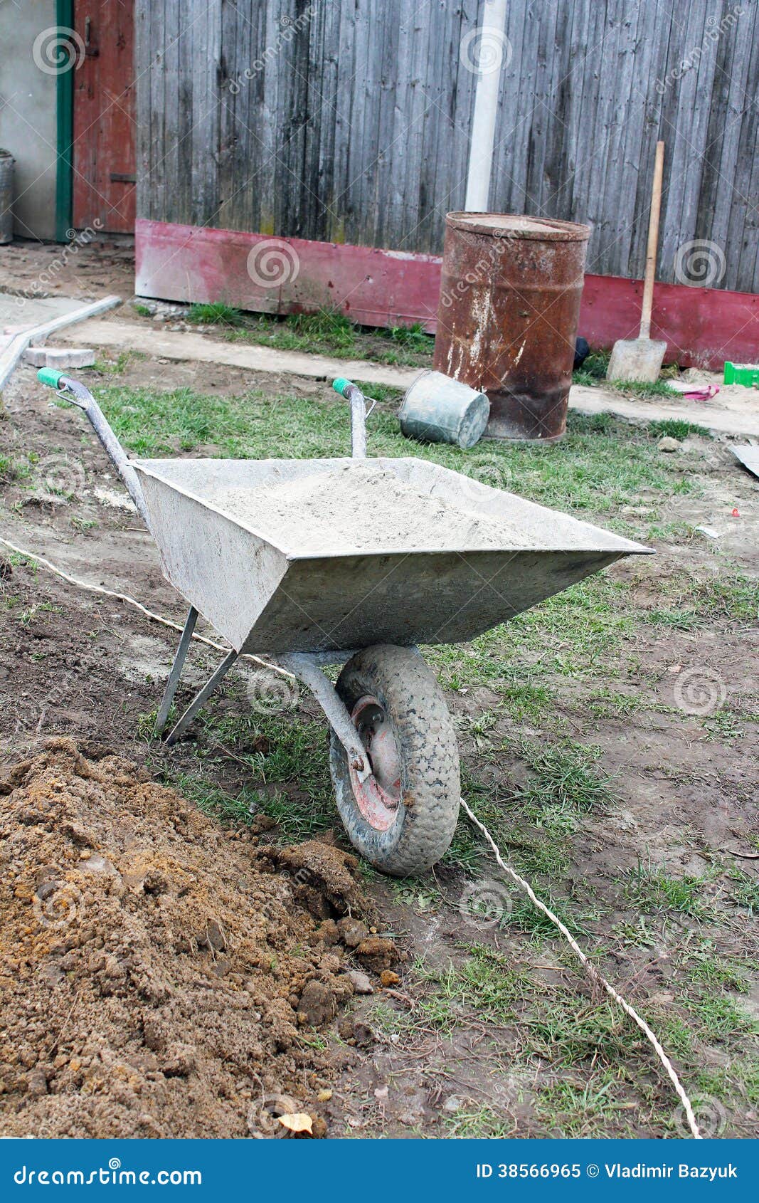 Wheelbarrow with sand stock image. Image of backgrounds - 38566965