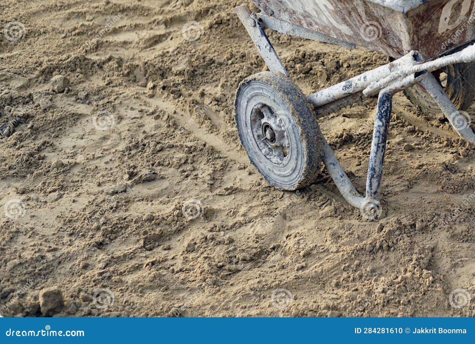 A Wheelbarrow on the Sand in the Construction Site Preparing Move Stock ...