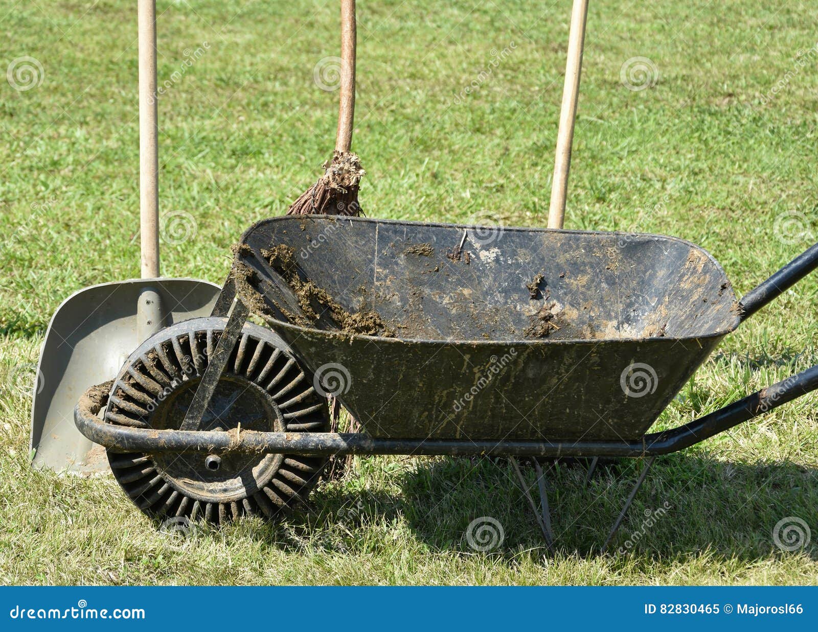 Wheelbarrow and shovel stock image. Image of scene, gardening - 82830465
