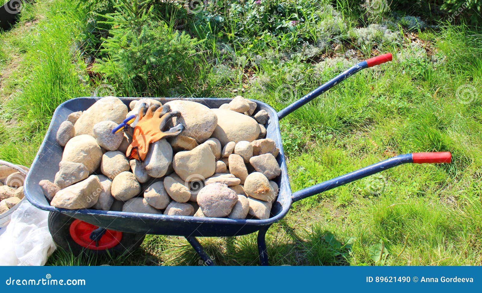 Wheelbarrow with stones stock photo. Image of farm, equipment - 89621490
