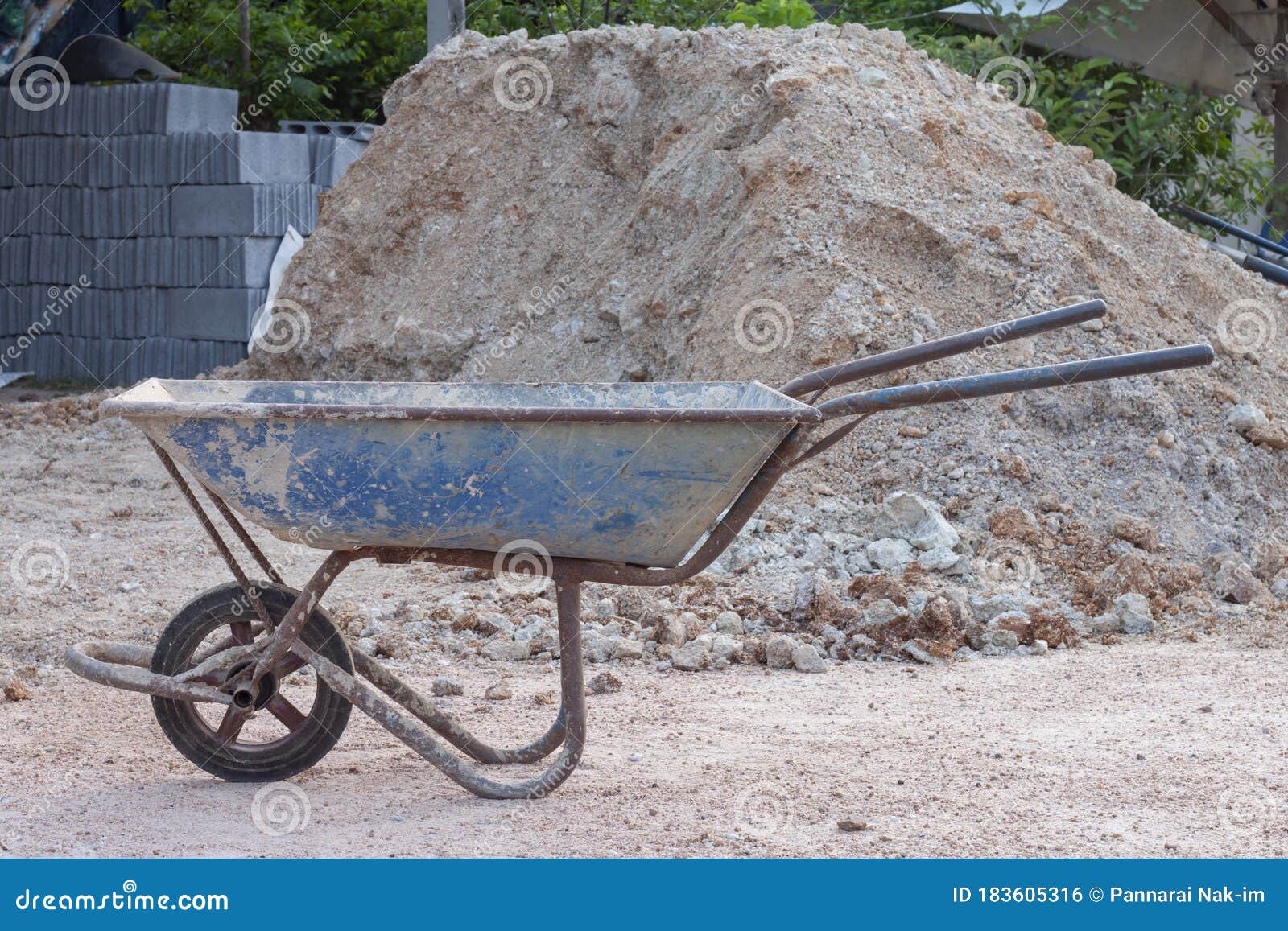 A Wheelbarrow is a Tool in the Construction Site. Stock Photo - Image ...
