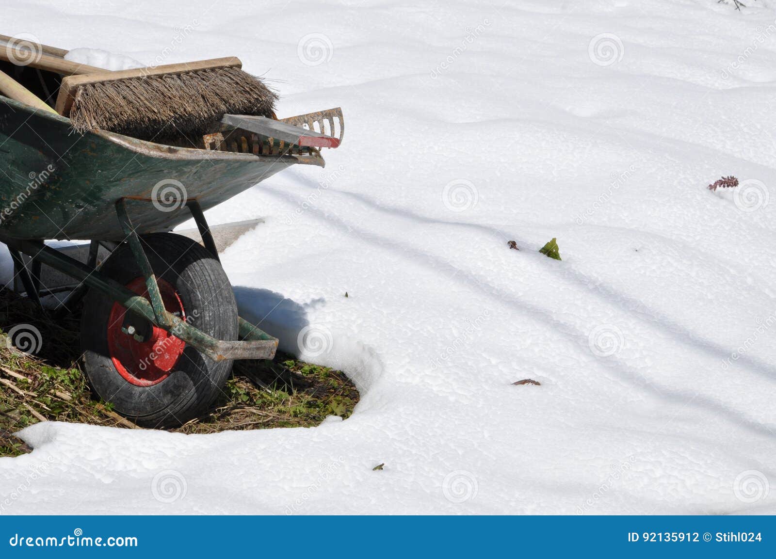 Wheelbarrow with Tools in Snow Stock Photo - Image of wheel, tools ...