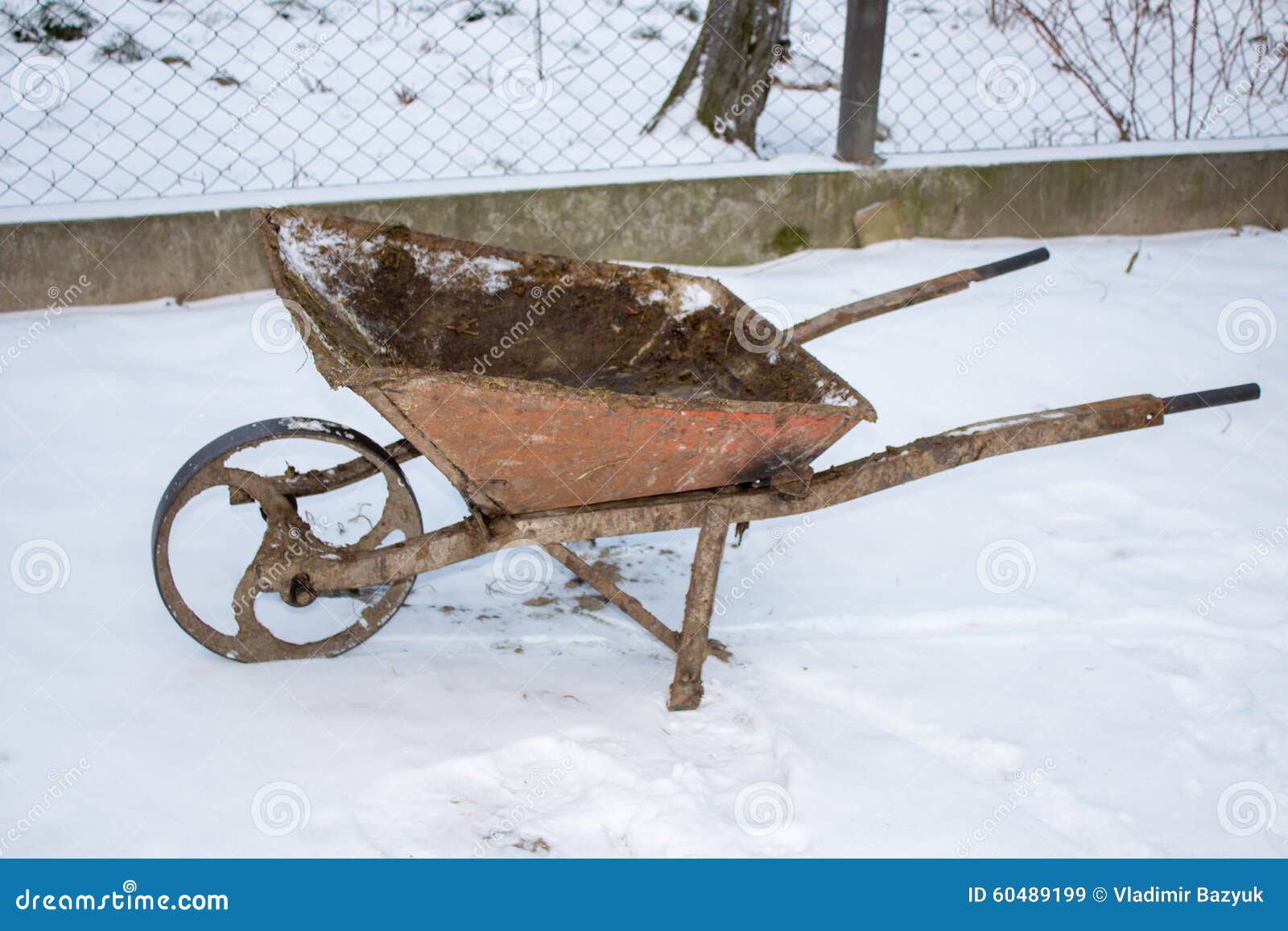 Wheelbarrow winter snow stock image. Image of white, snow - 60489199