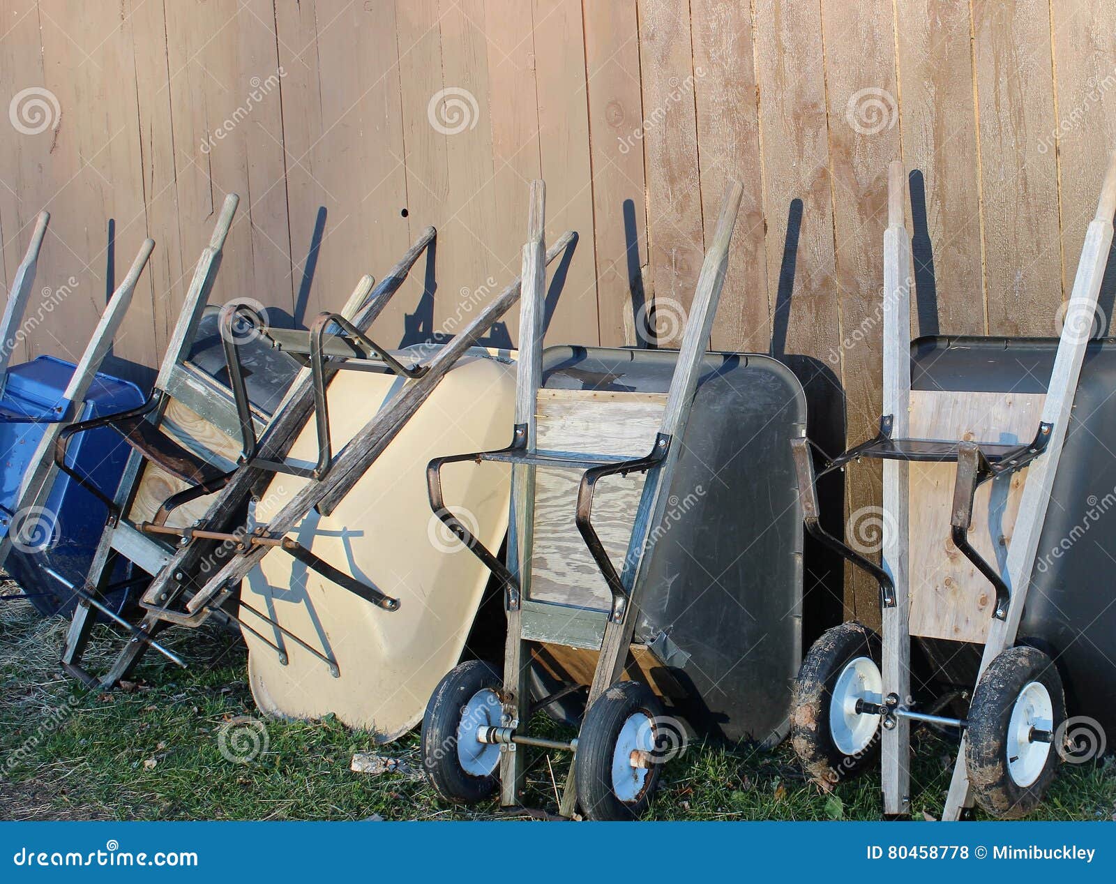 Wheelbarrows stock photo. Image of barn, leaning, wooden - 80458778