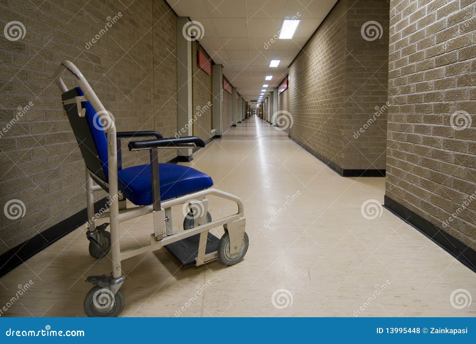 Wheelchair in an Empty NHS Hospital Corridor Stock Photo - Image of ...