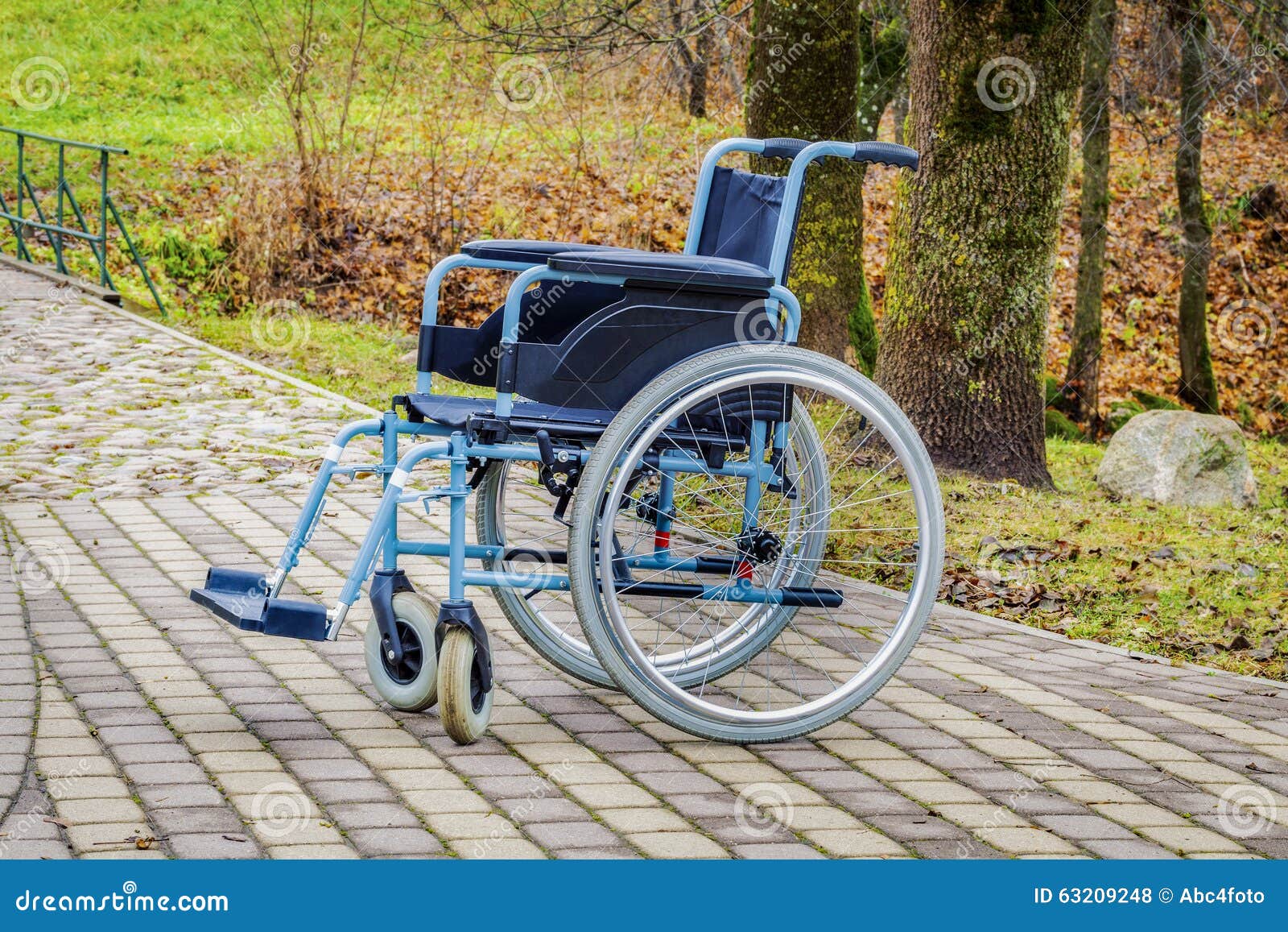 The Wheelchair in the Park Path Stock Photo - Image of pavement ...