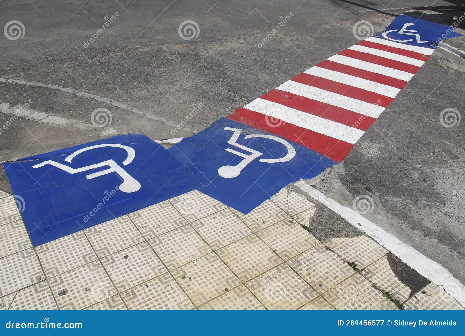 Wheelchair Ramp with Accessibility Symbol and Crosswalk Stock Image ...