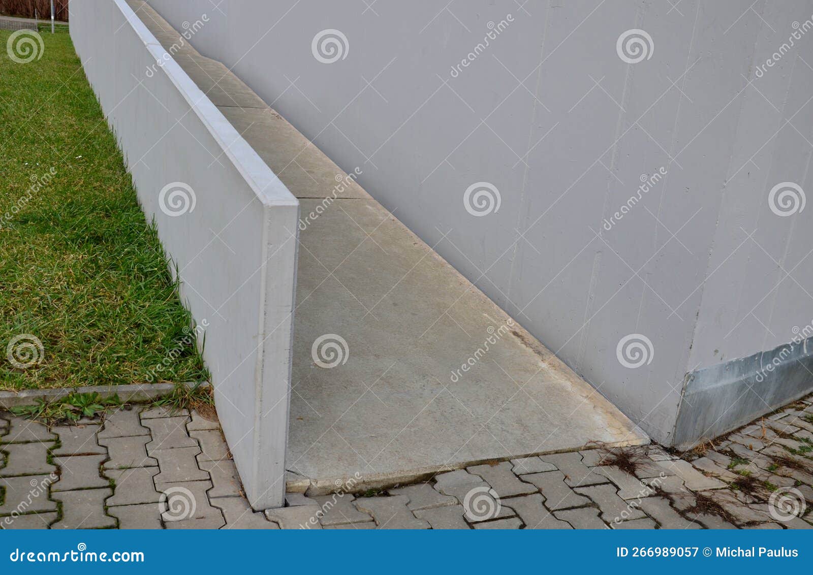 A Bridge Railing with Vertical Fence Posts Anchored into the Ground ...