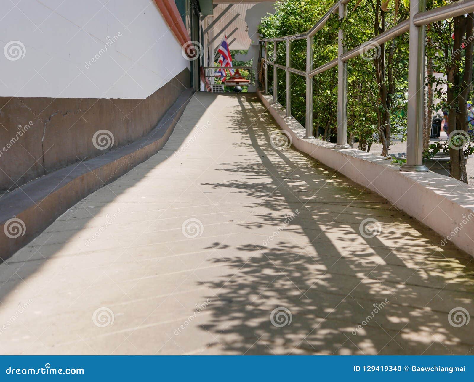 Wheelchair Ramp or Uphill Walkway Stock Photo - Image of strollers ...