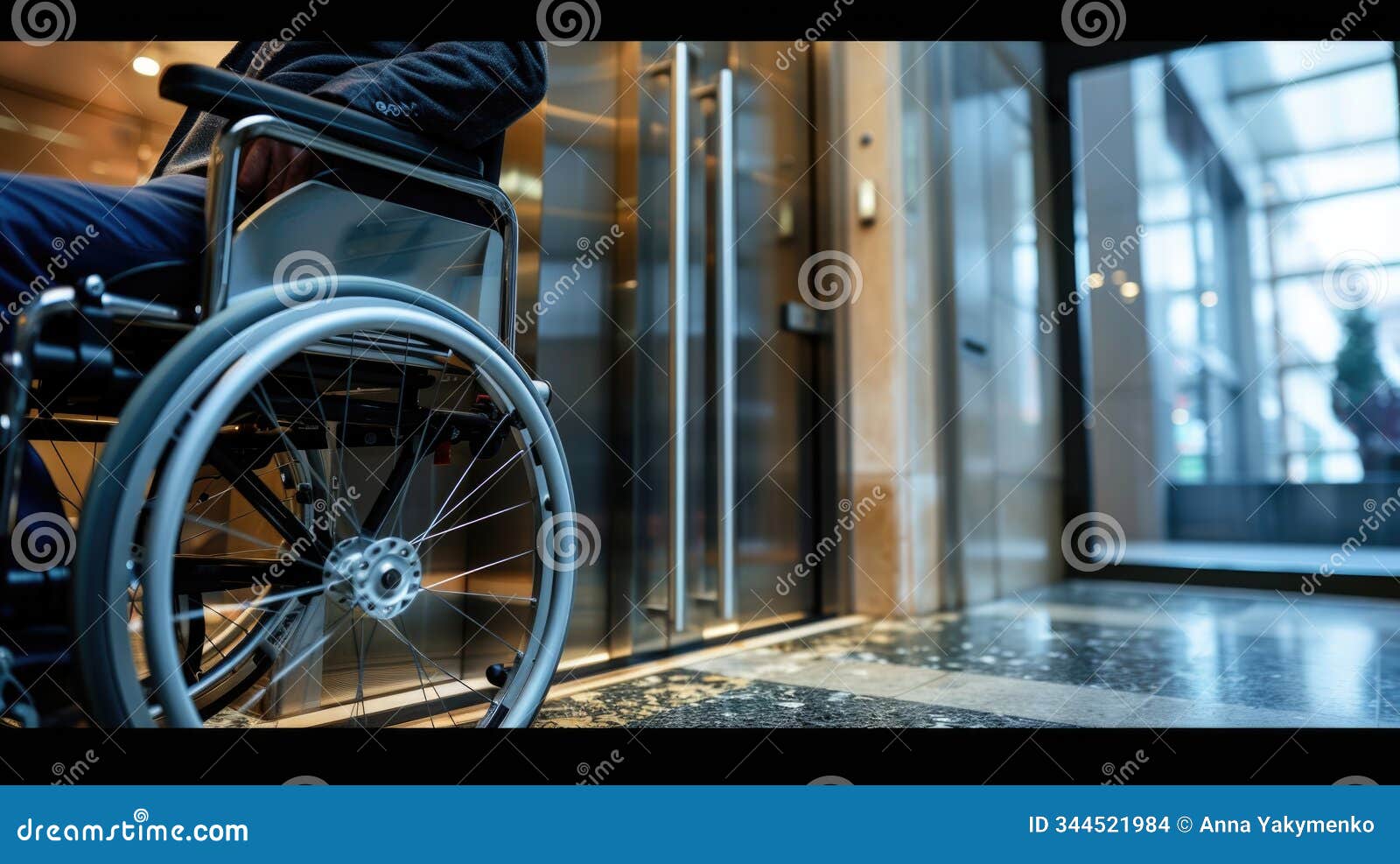 Wheelchair User Waiting Near Elevator in Modern Building Lobby Stock ...