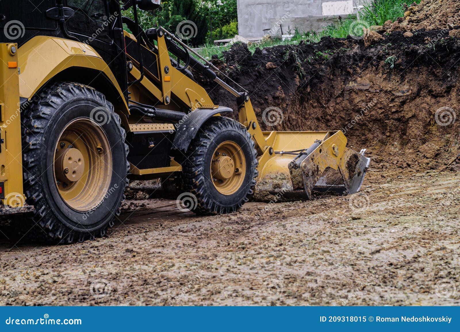 Wheeled Loader Excavator With Backhoe For Earthmoving Works Royalty ...