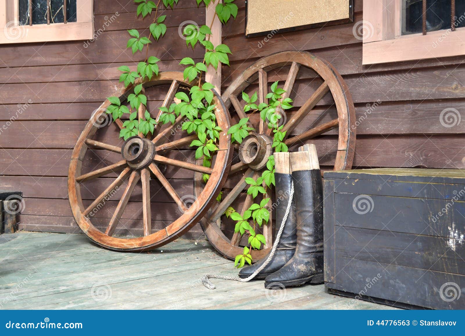 Wheels from Cart with Boots Stock Image - Image of cart, retro: 44776563