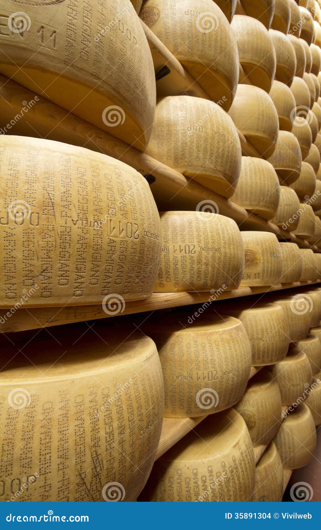 Wheels of Cheese on the Racks Stock Photo - Image of food, alimentary ...