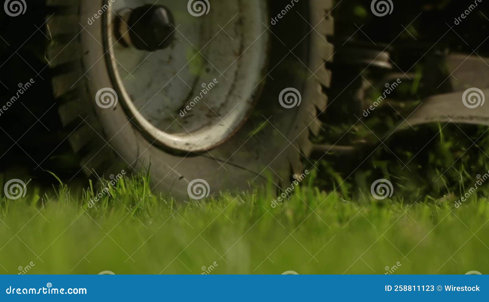 Wheels of the Lawn Mower Cutting Grass Stock Video - Video of driving ...