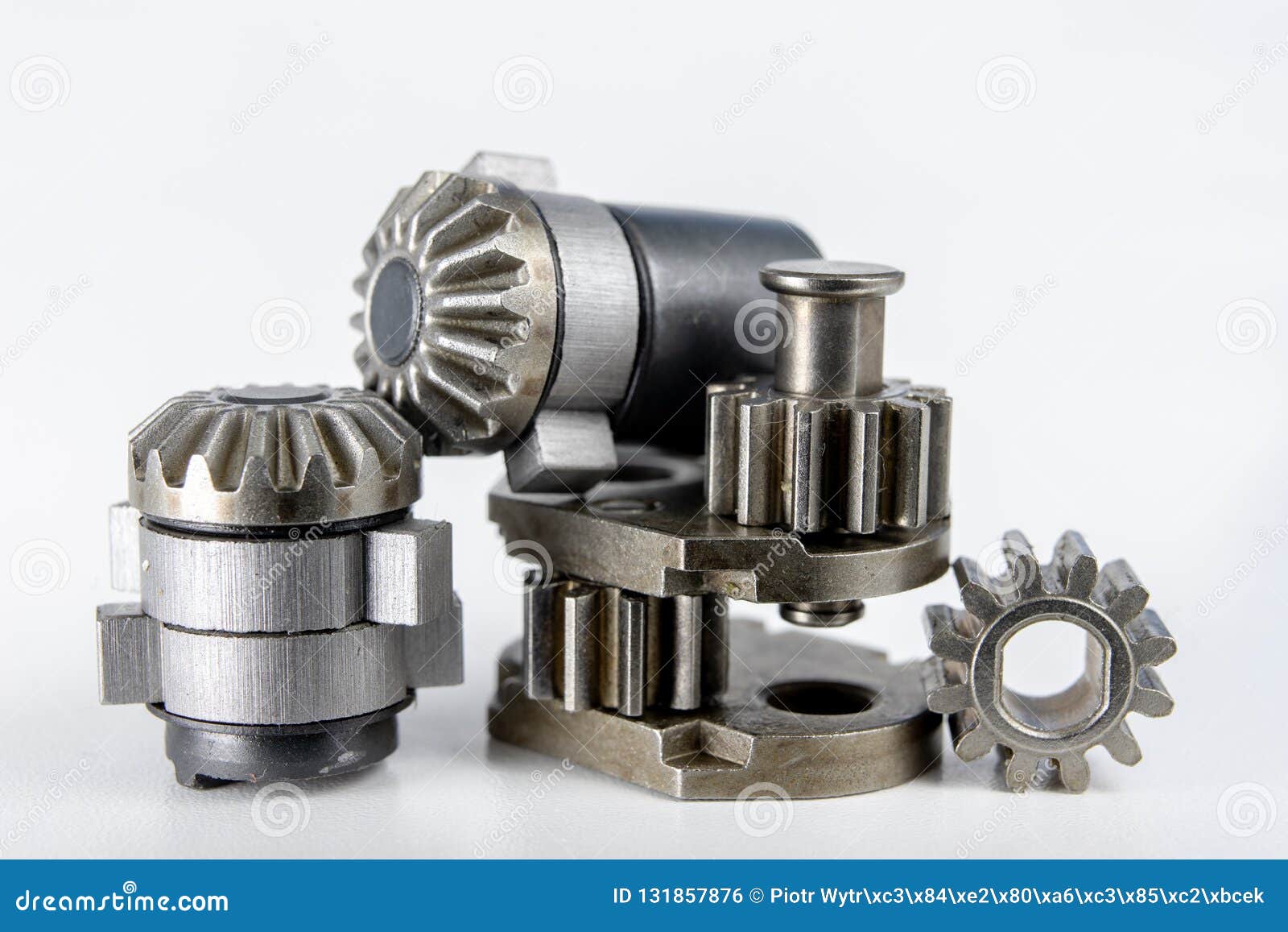 Wheels for Mechanical Gears on a White Workshop Table. Mechanical Parts ...