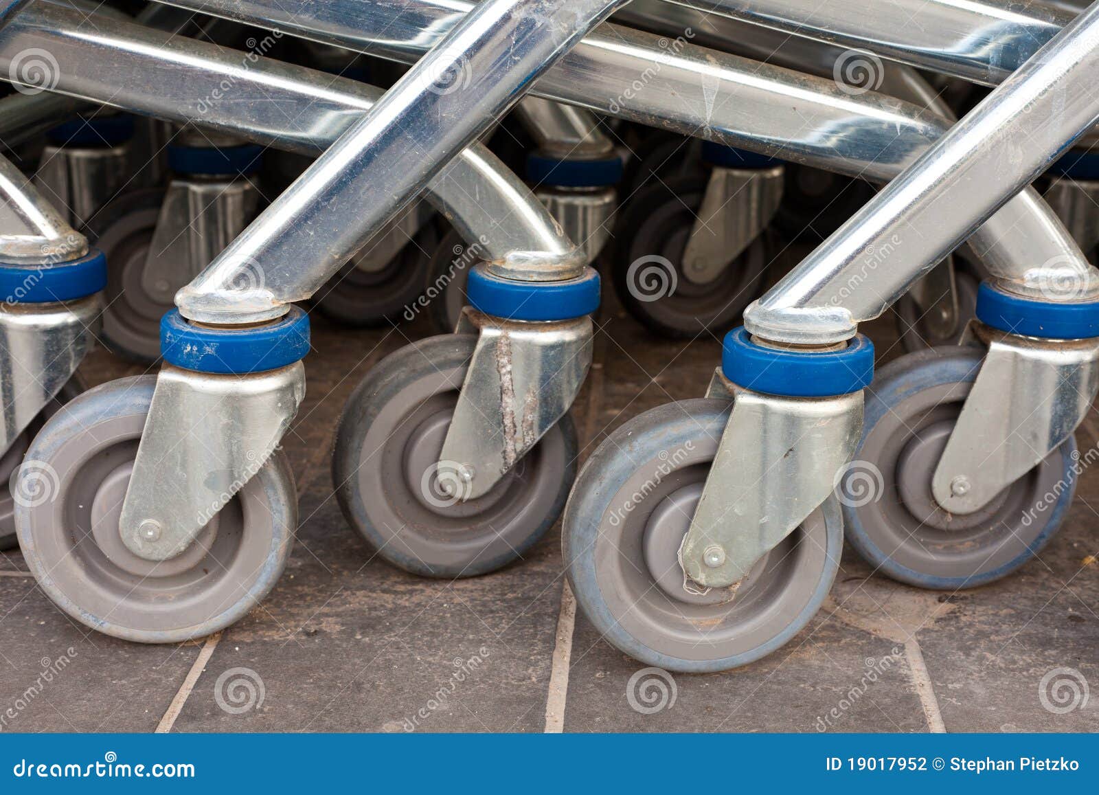 Wheels of Metal Shopping Carts Stock Photo - Image of metal, retail ...