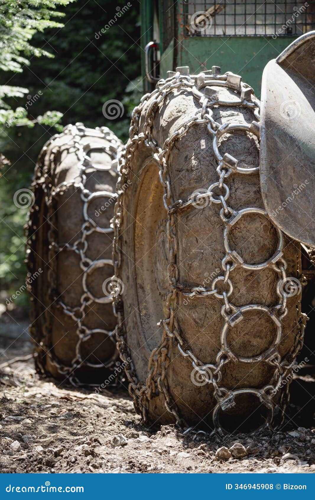 Wheels with mud chains stock photo. Image of large, awareness - 346945908