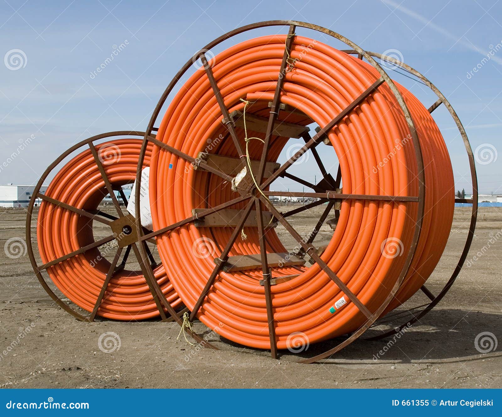 Wheels of plastic pipes stock image. Image of building - 661355
