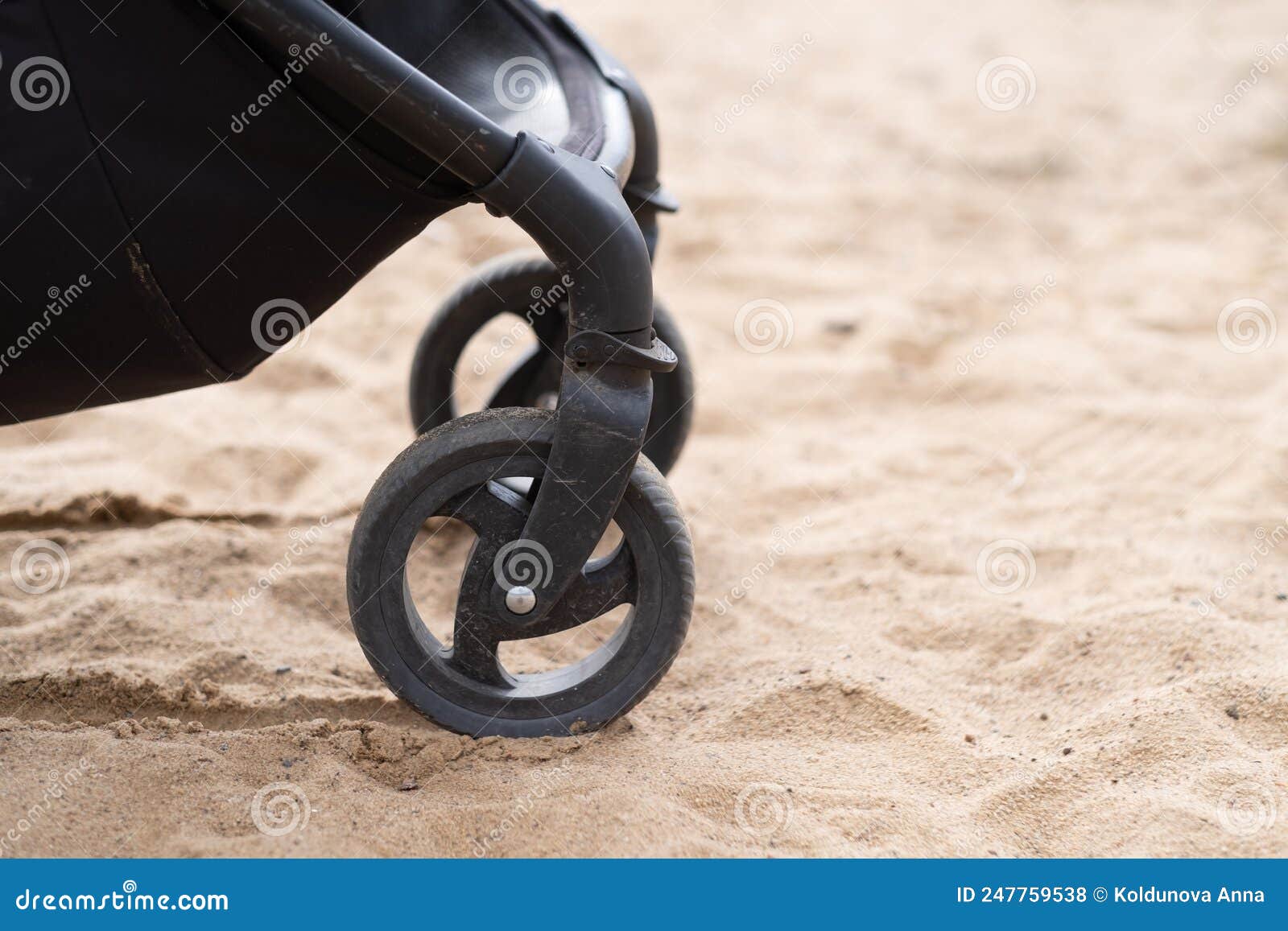 Wheels at Sandy Beach. Stroller that Could Move on Sand Stock Photo ...