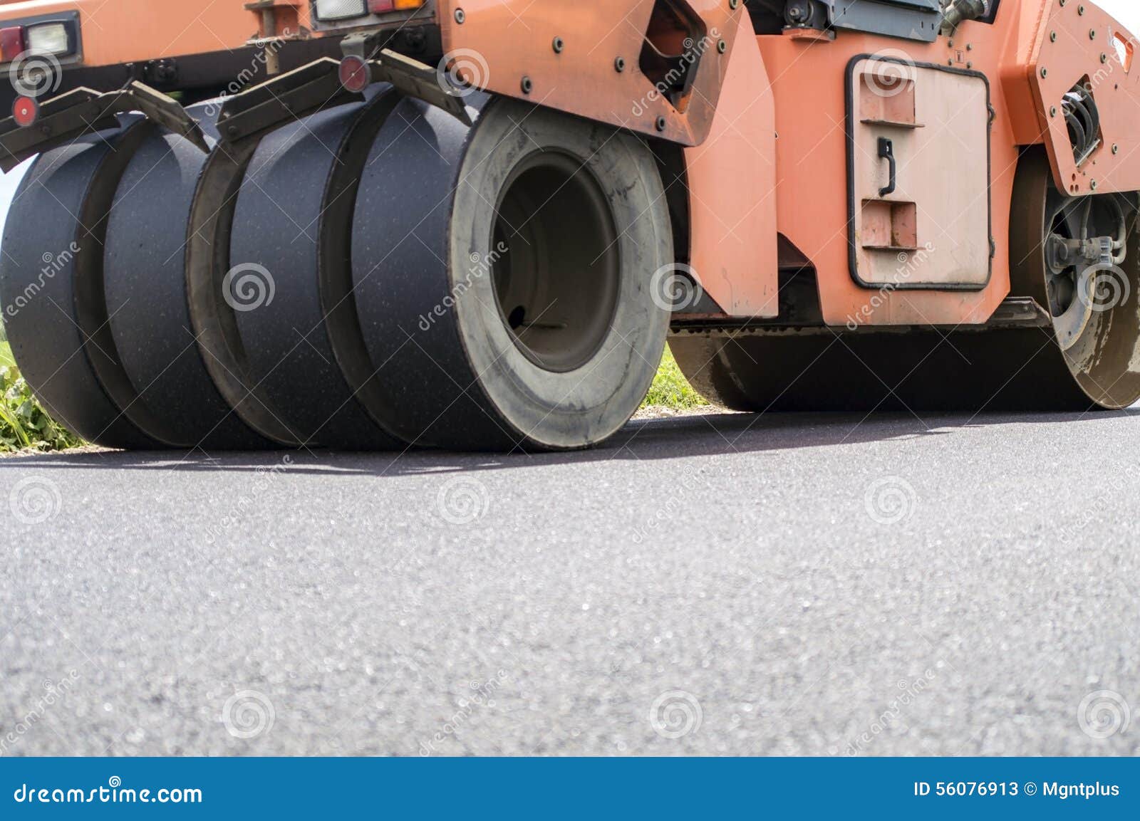 Wheels on the steamroller stock image. Image of industry - 56076913