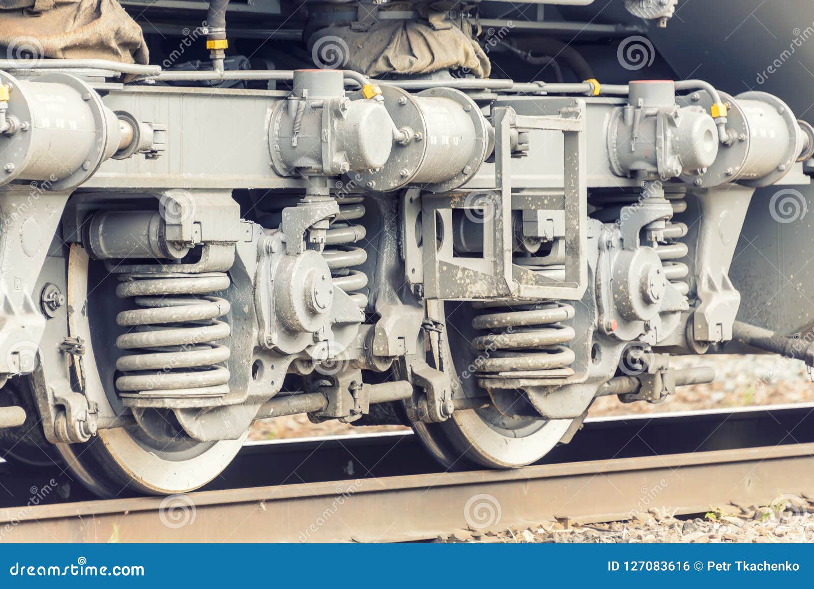 Train wheels on rails stock photo. Image of chassis - 127083616
