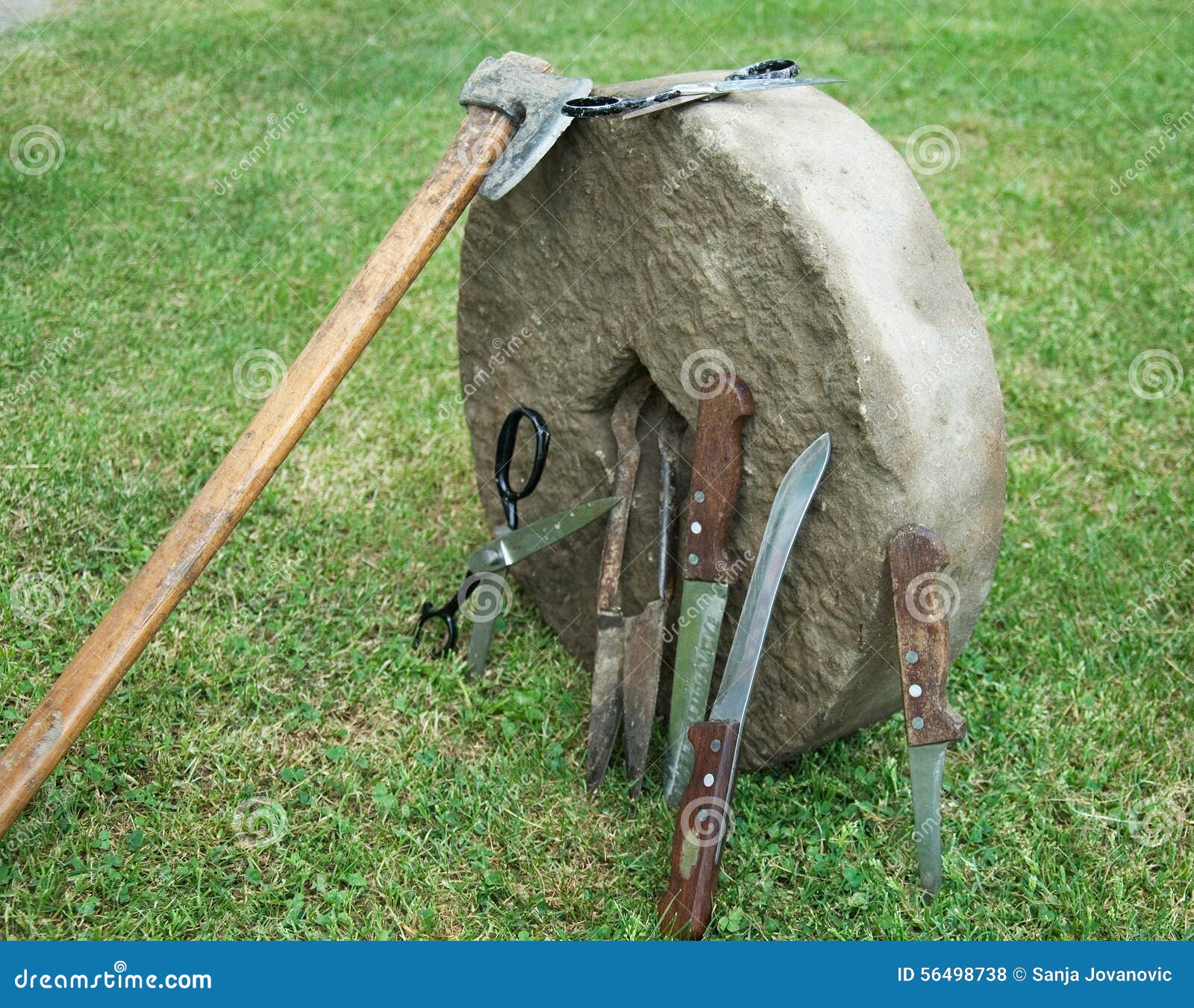 An Old Whetstone For Sharpening Knives. Grinding Wheel On An Old ...