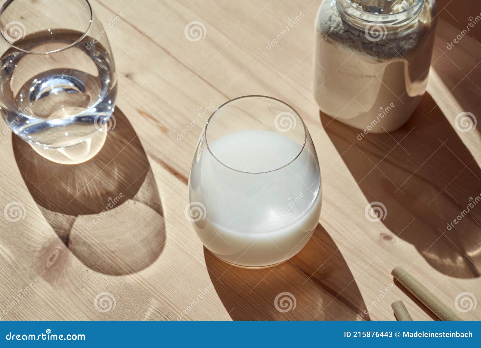 Whey Protein Drink with Whey Protein Powder and Water in the Background ...