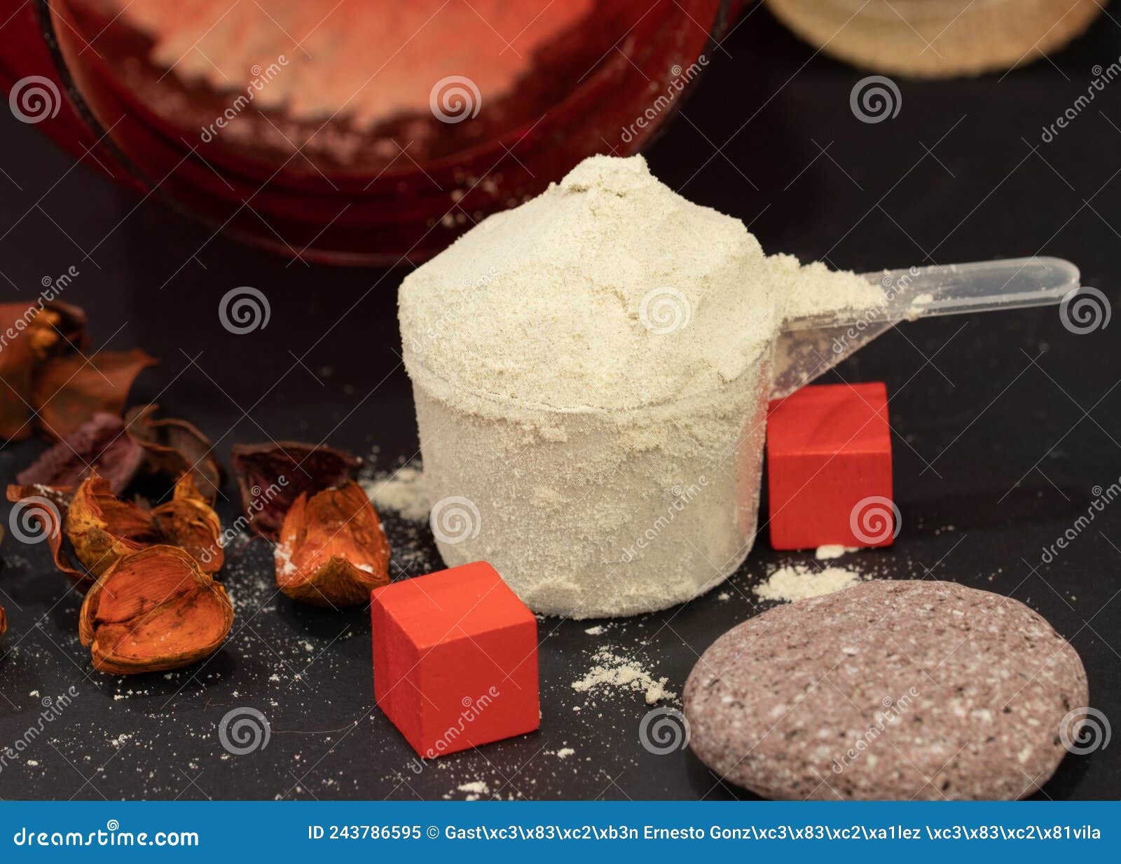 Whey Protein Scoop on Black Background and Red Container Stock Image ...